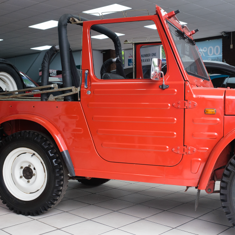 Suzuki Jimny First Gen - light on a lens